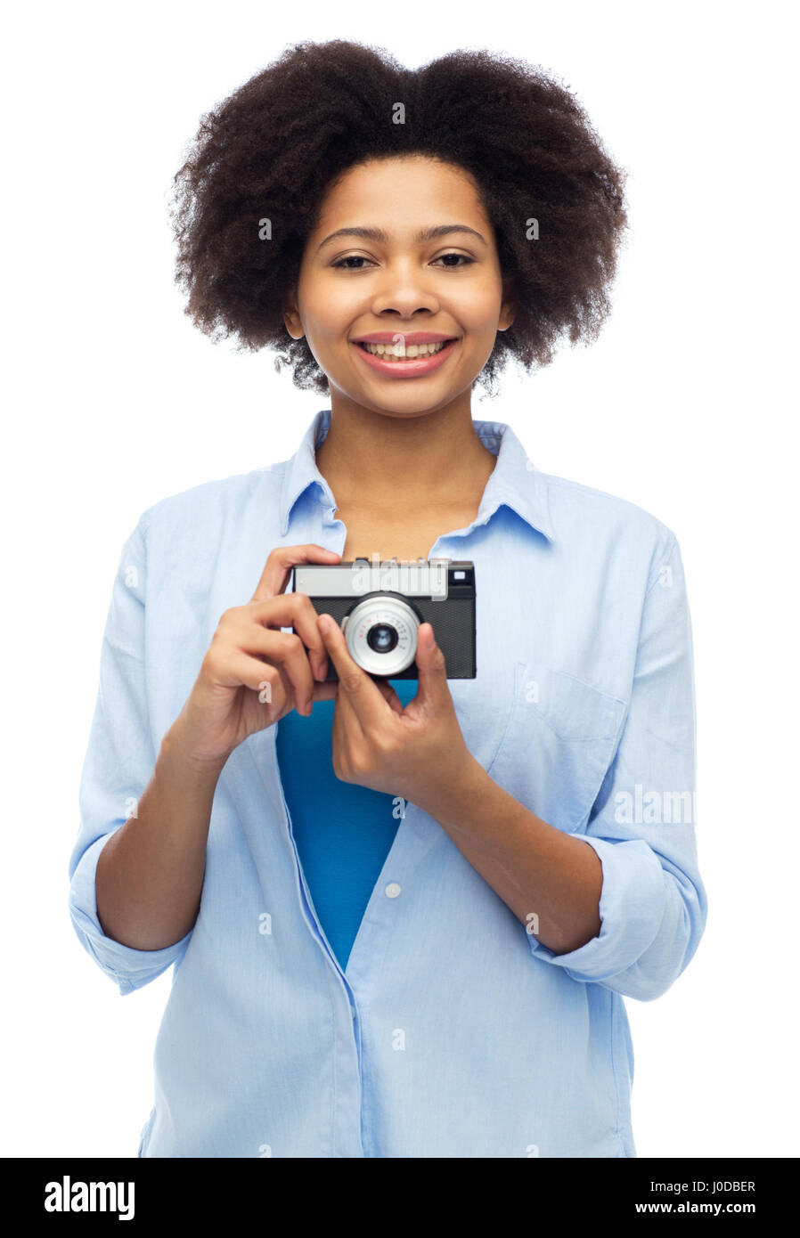 happy african american woman with film camera Stock Photo - Alamy