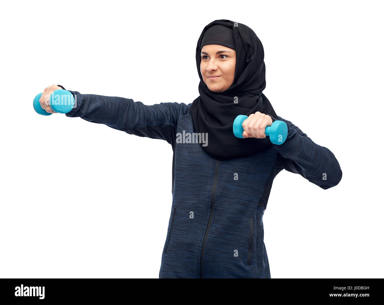 muslim woman in hijab with dumbbells doing fitness Stock Photo - Alamy