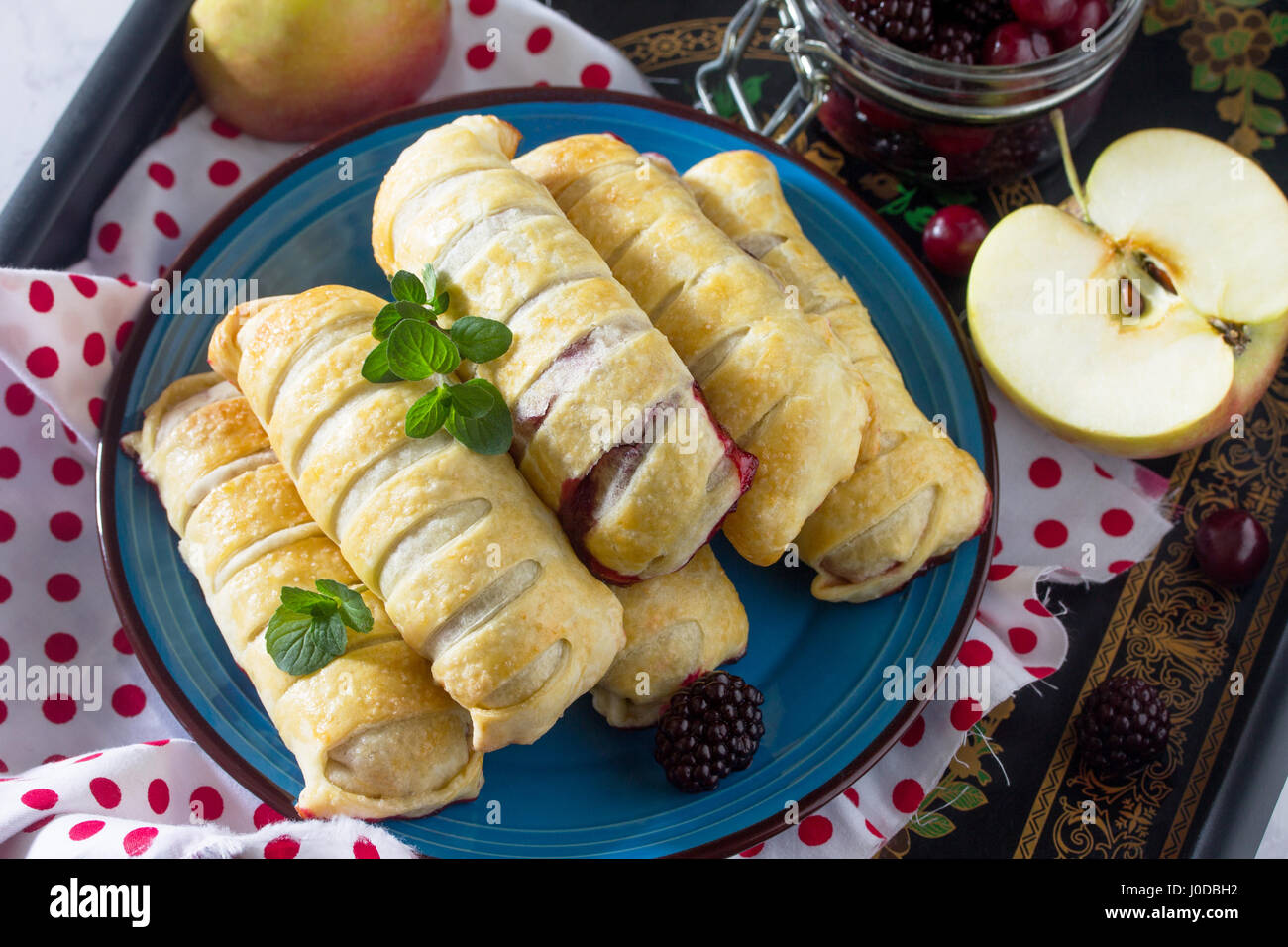 Breakfast background. Homemade apple mini strudel with fresh apples ...