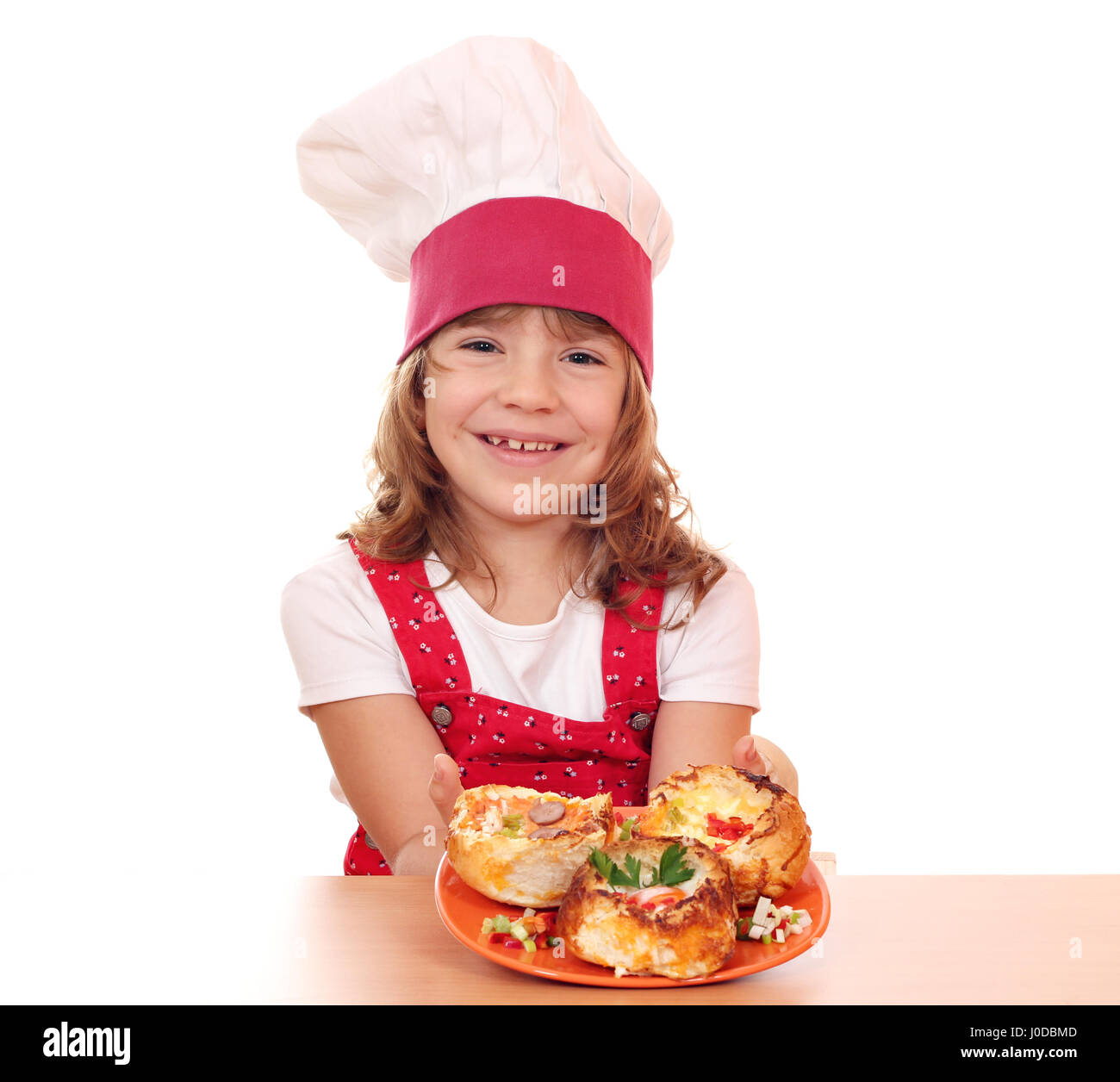 happy beautiful little girl cook Stock Photo - Alamy
