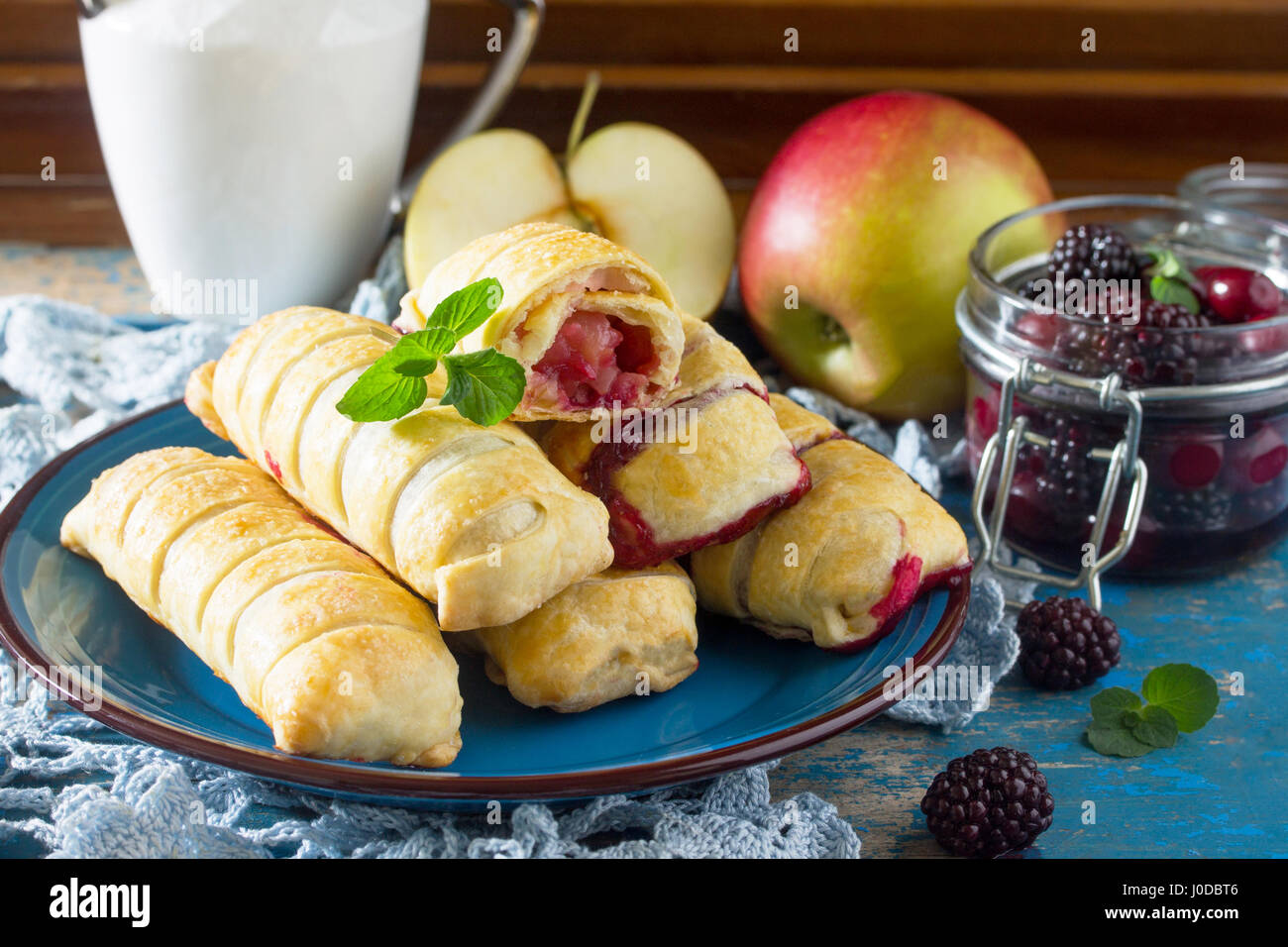 Breakfast background. Homemade apple mini strudel with fresh apples ...