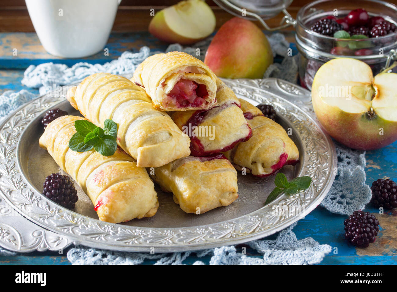 Breakfast background. Homemade apple mini strudel with fresh apples ...