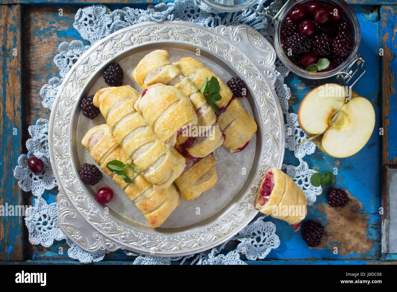 Breakfast background. Homemade apple mini strudel with fresh apples ...
