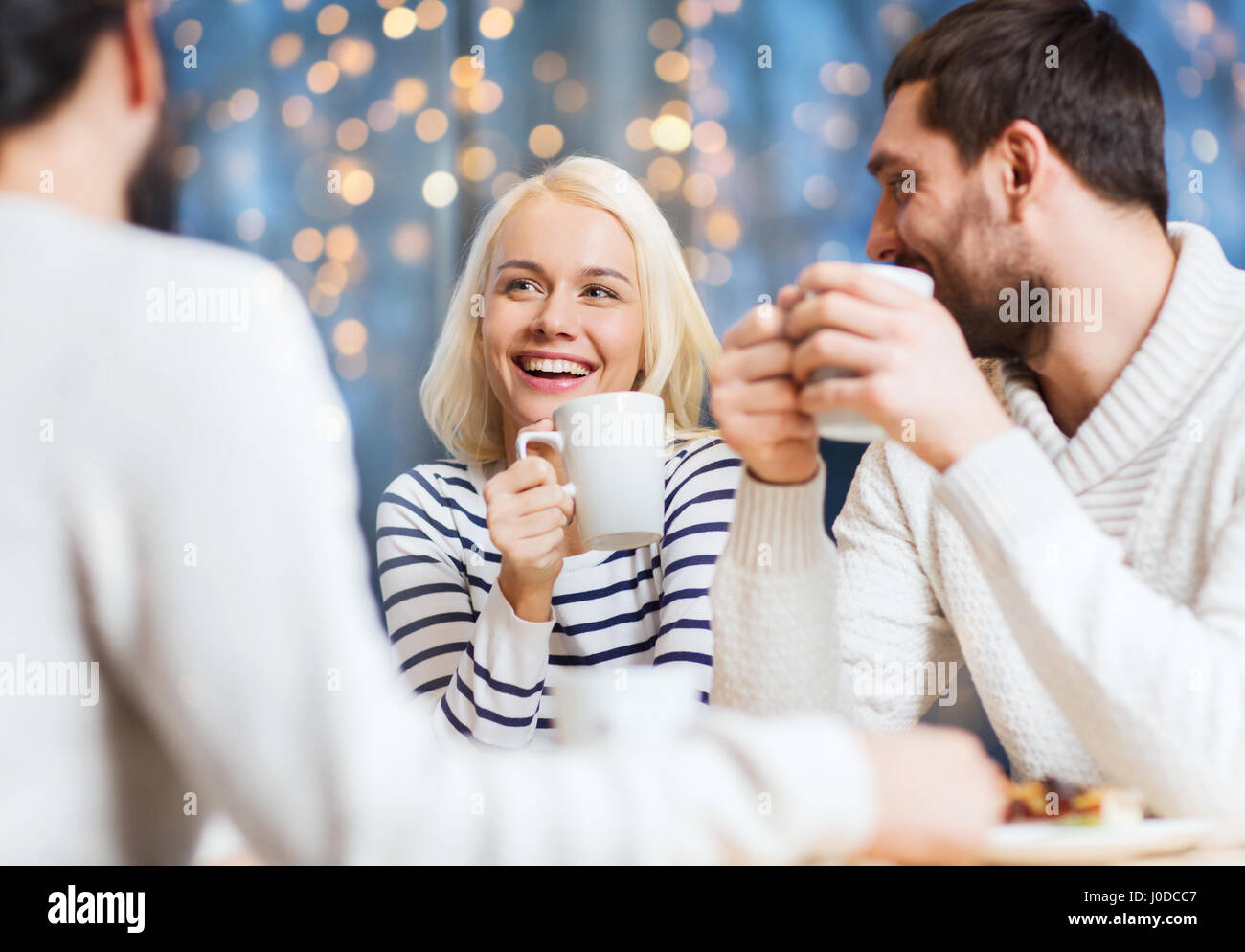 happy friends meeting and drinking tea or coffee Stock Photo - Alamy