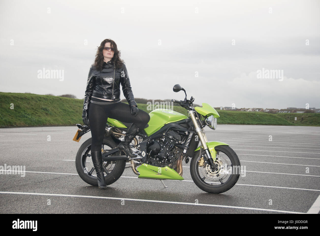 Brunette girl on triumph street hi-res stock photography and images - Alamy