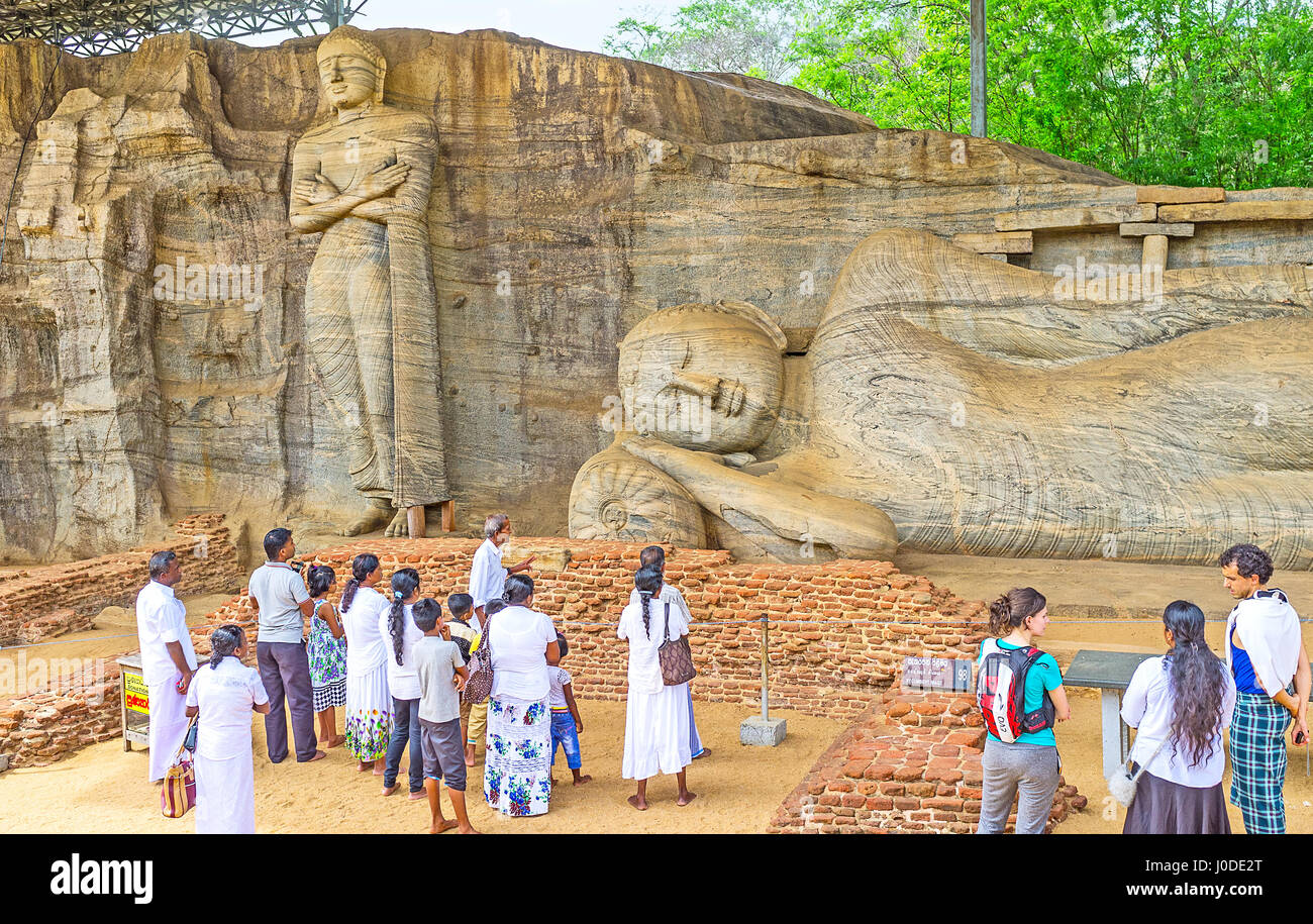 POLONNARUWA, SRI LANKA - NOVEMBER 27, 2016: The tourists discover the ...