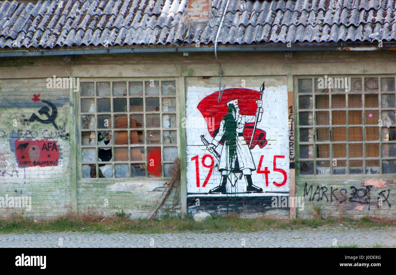 Wall of abandoned building, painted with graffiti Stock Photo - Alamy