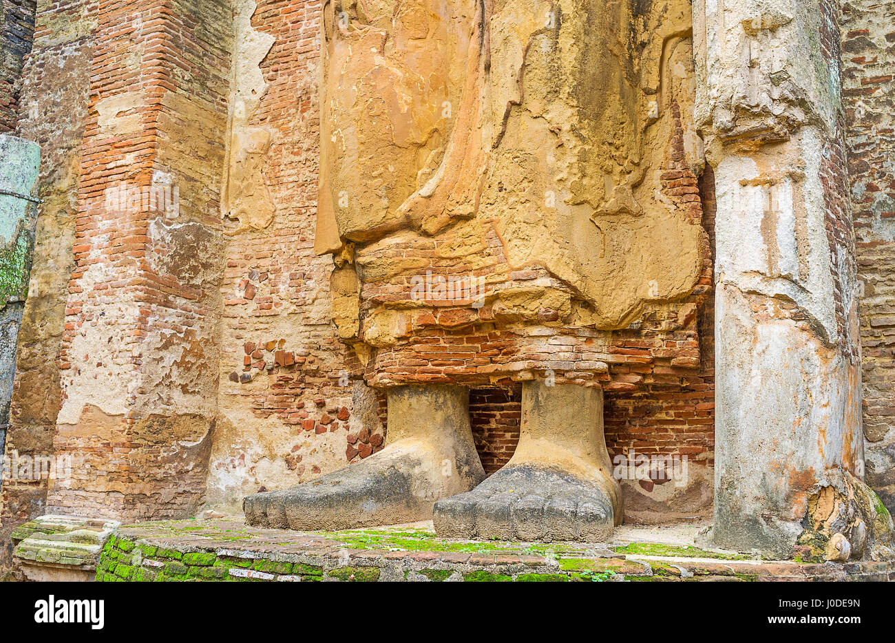 The legs of the Buddha statue in Lankathilaka Temple, located at the ...