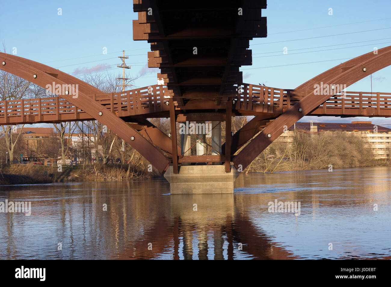 The tridge Midland MI wooden footbridge over river Stock Photo - Alamy