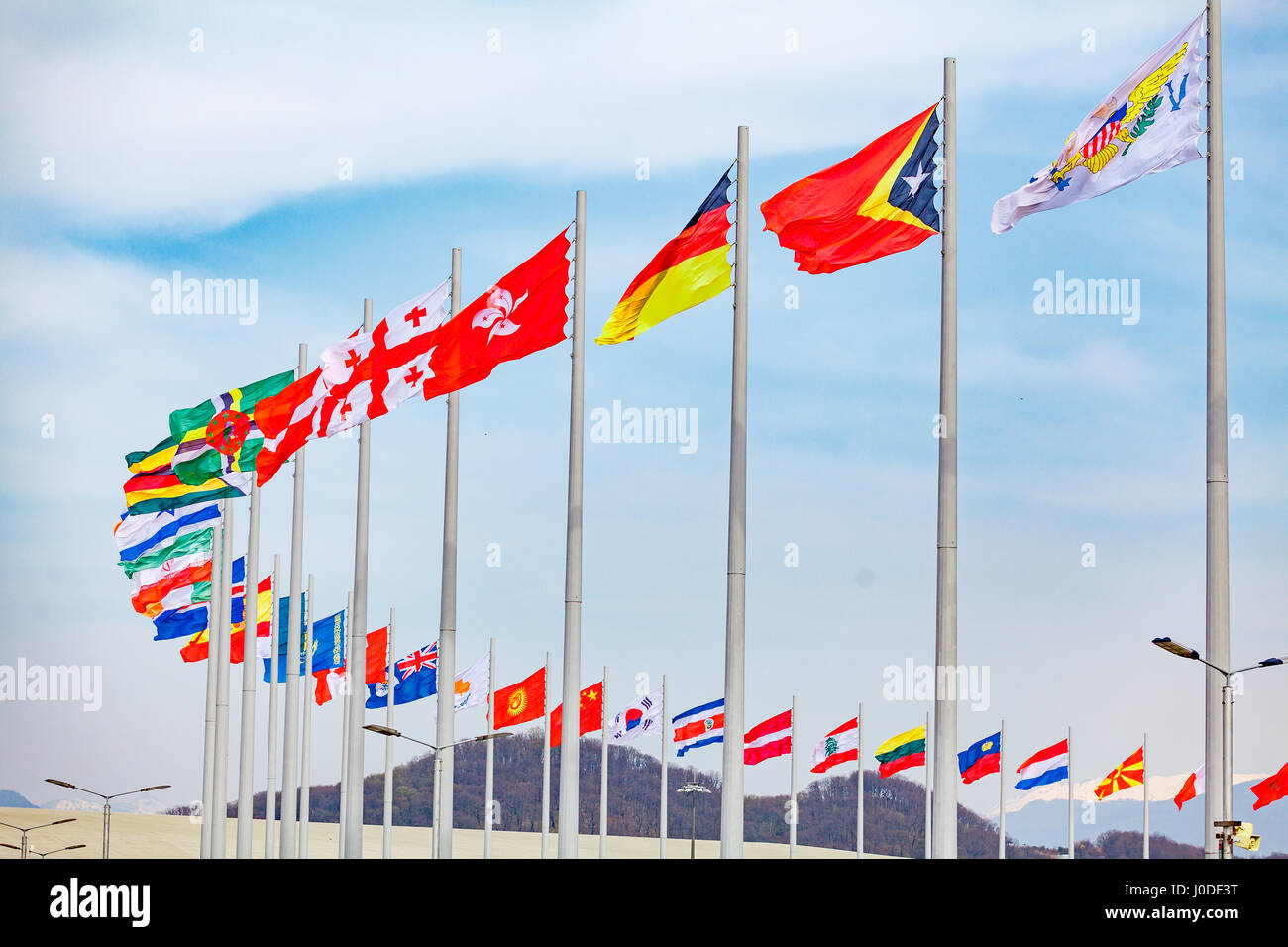 Flags of countries. different countries on the flagpole Stock Photo - Alamy