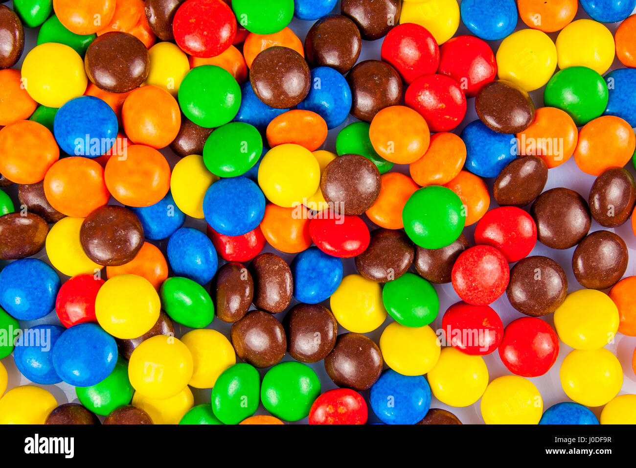 Candy background. Multi colored candy Stock Photo - Alamy