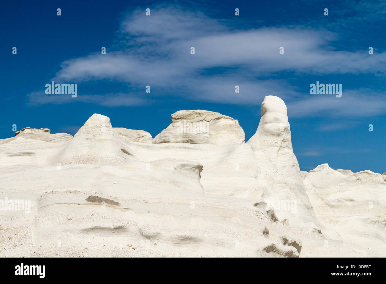 White rocks of Sarakiniko on Milos island in the Cyclades Stock Photo ...