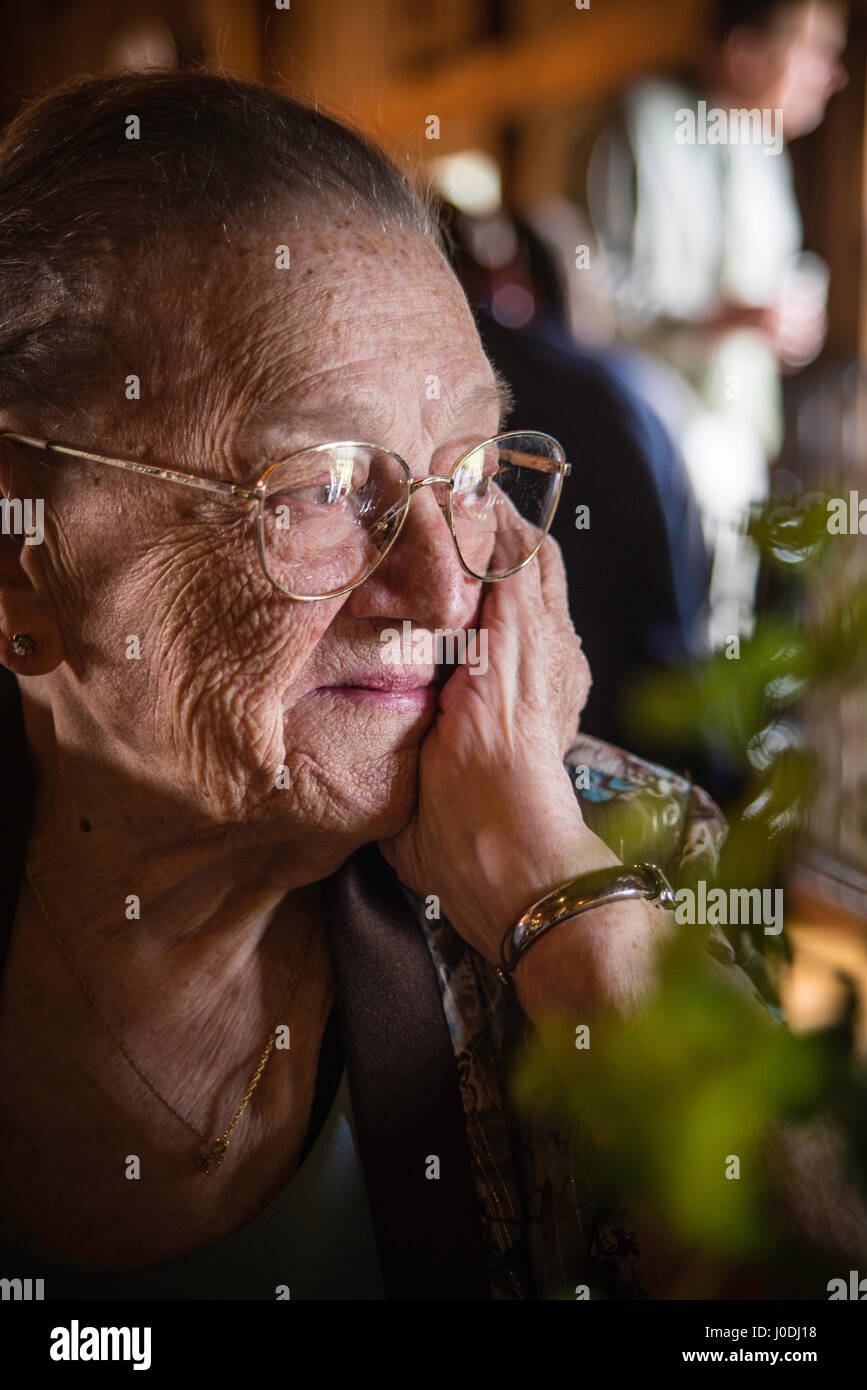 Senior citizen, elderly woman with glasses, smiling Stock Photo - Alamy