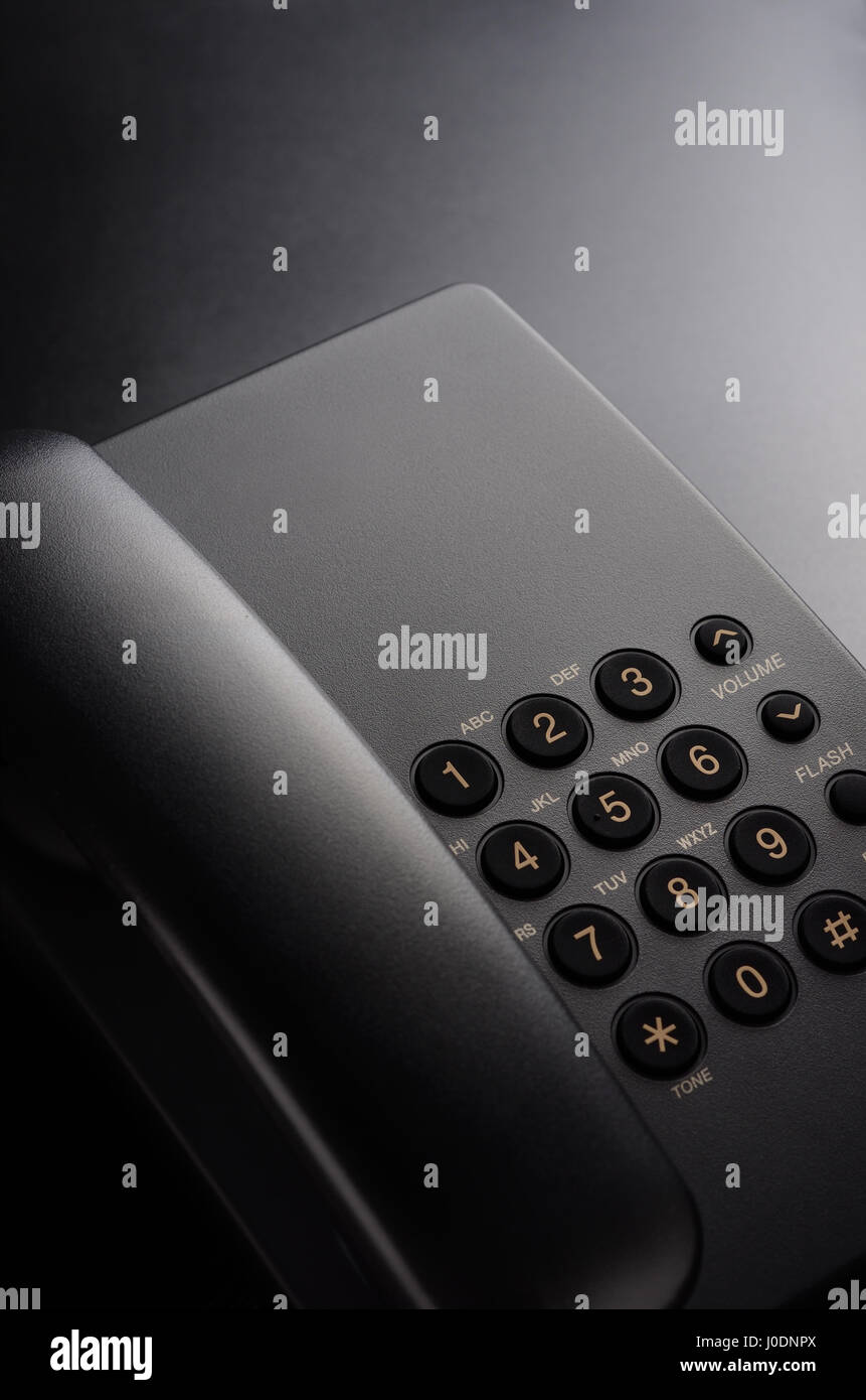 Black telephone cord office phone hi-res stock photography and images ...