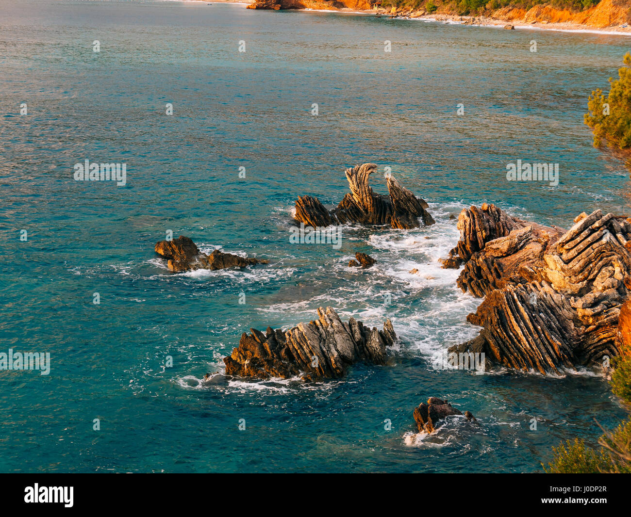 Rocks on the sea in Montenegro. Rocky coast. Wild beach. Dangero Stock ...