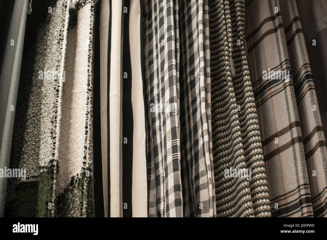 Texture sets of fabrics hang on the trempel in the closet Stock Photo ...