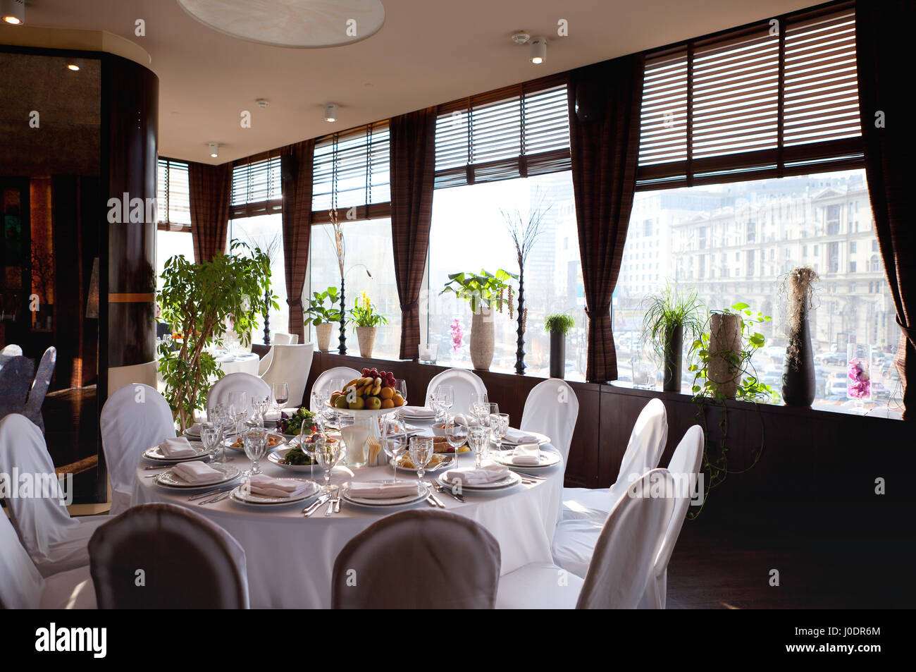 Serving in the restaurant on a Sunny day. Wedding reception song white ...