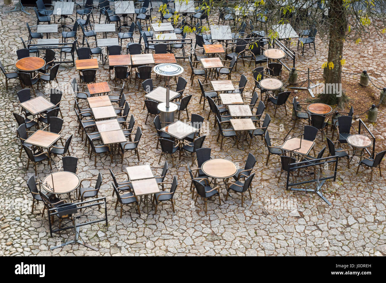View from above outdoor empty tables and chairs of cafe Stock Photo - Alamy