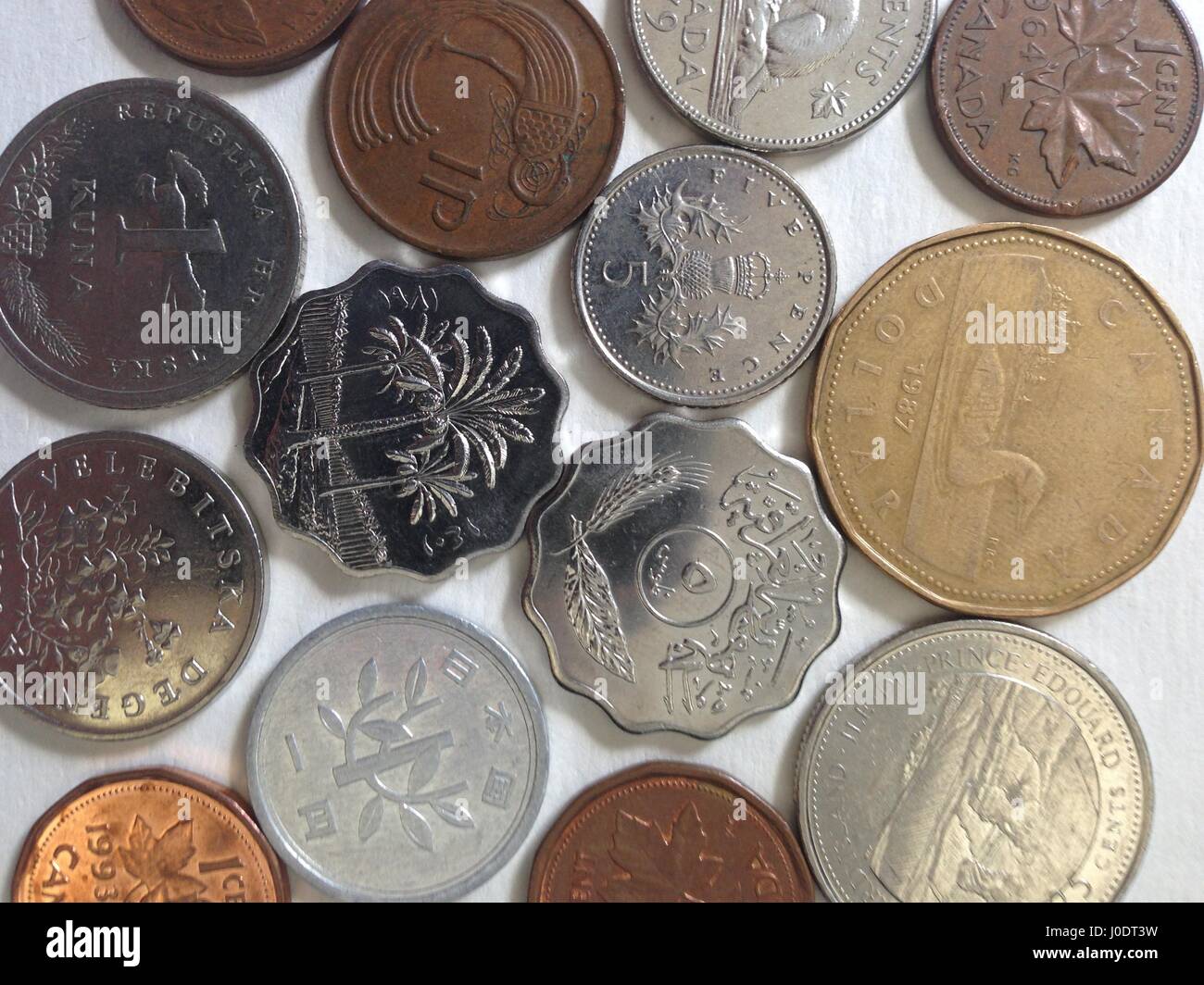 a collection of foreign coins Stock Photo - Alamy