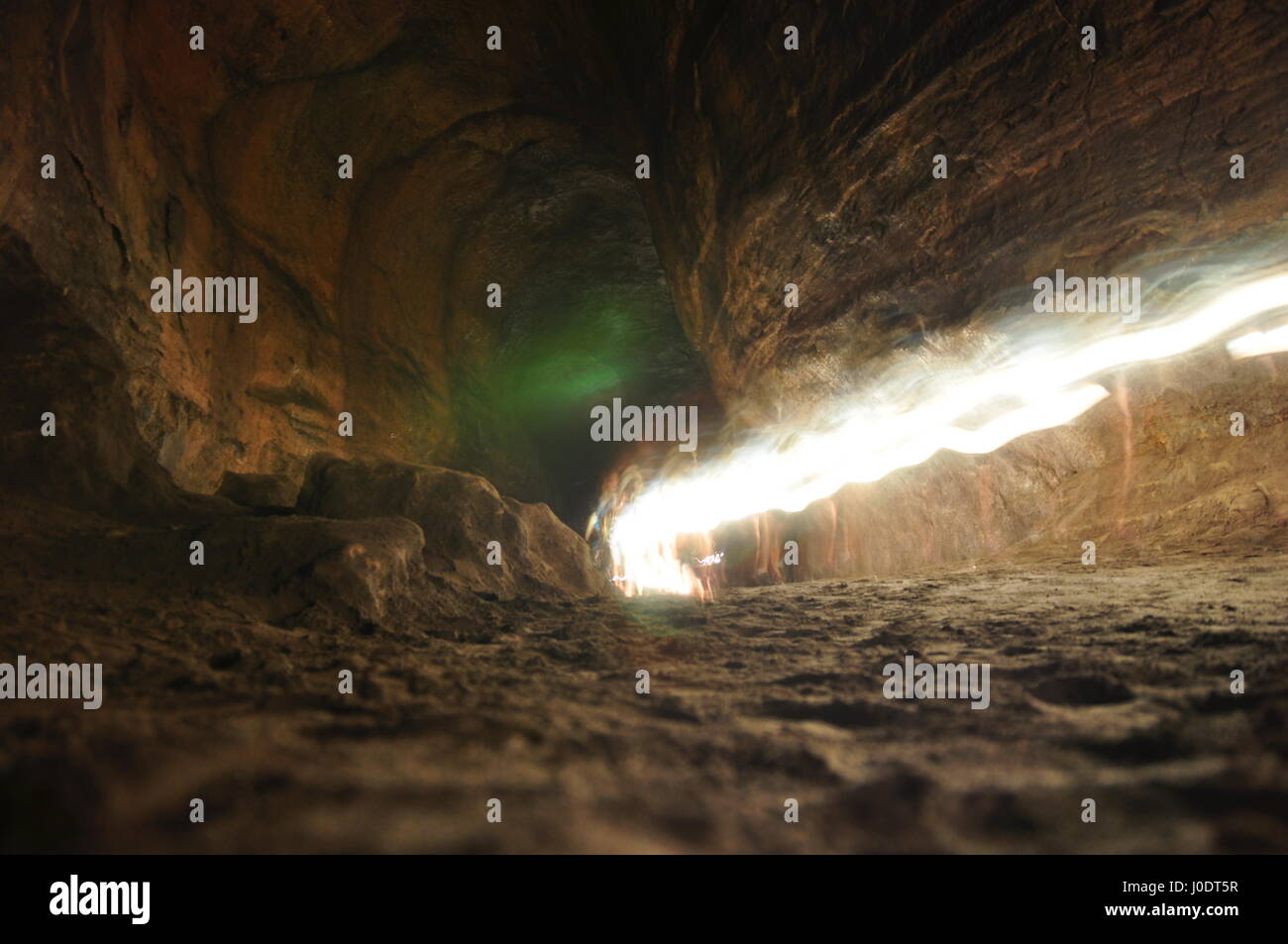 time lapse flashlights create lightning streaks through lava tube caves ...