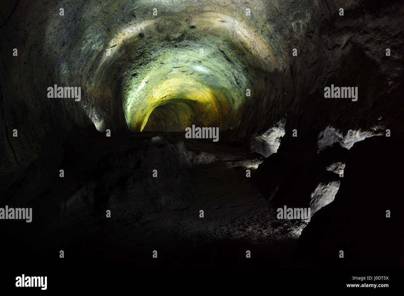time lapse flashlights create lightning streaks through lava tube caves ...