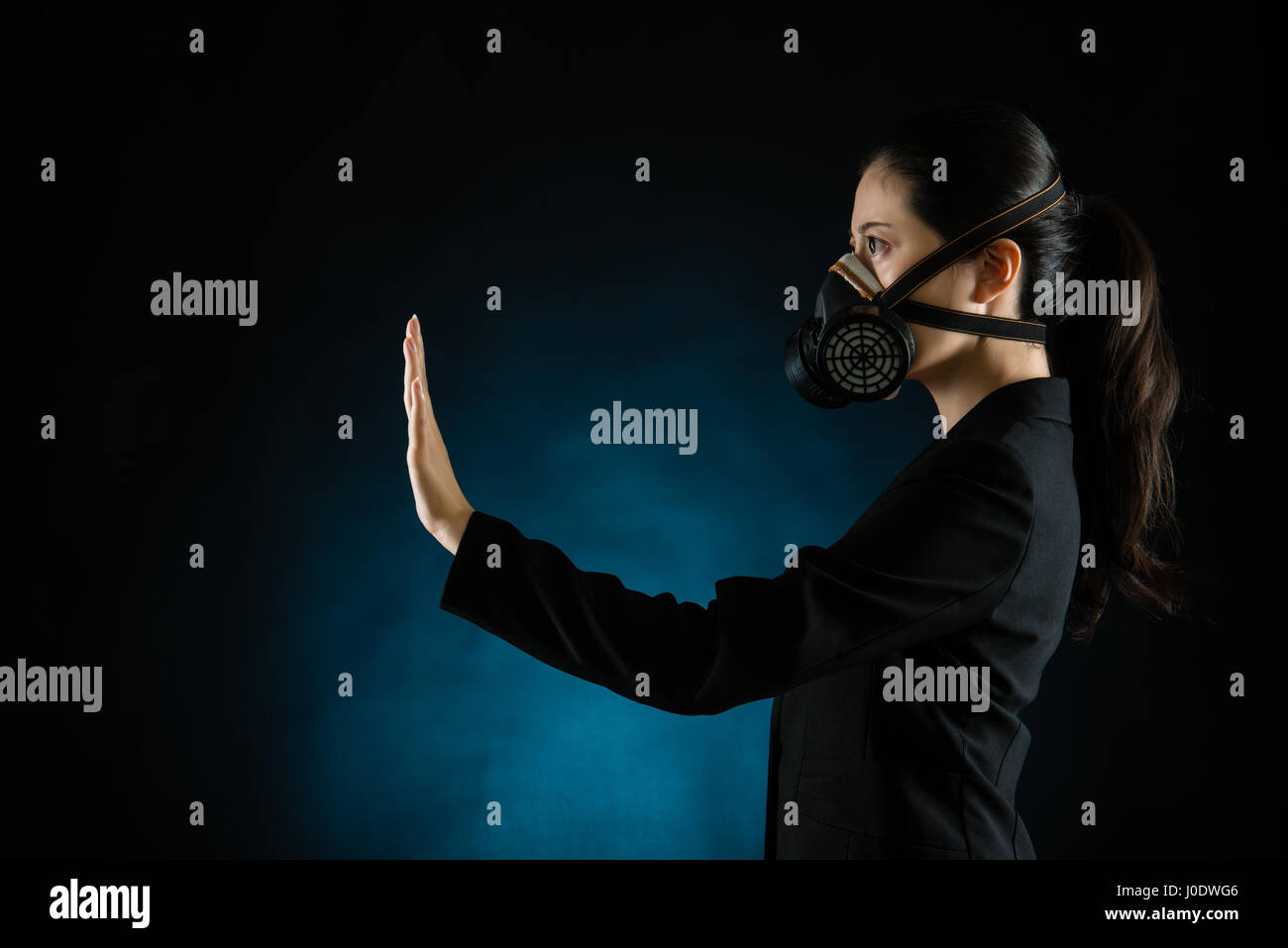 Asian business woman showing reject hand gesture wearing a face mask to ...