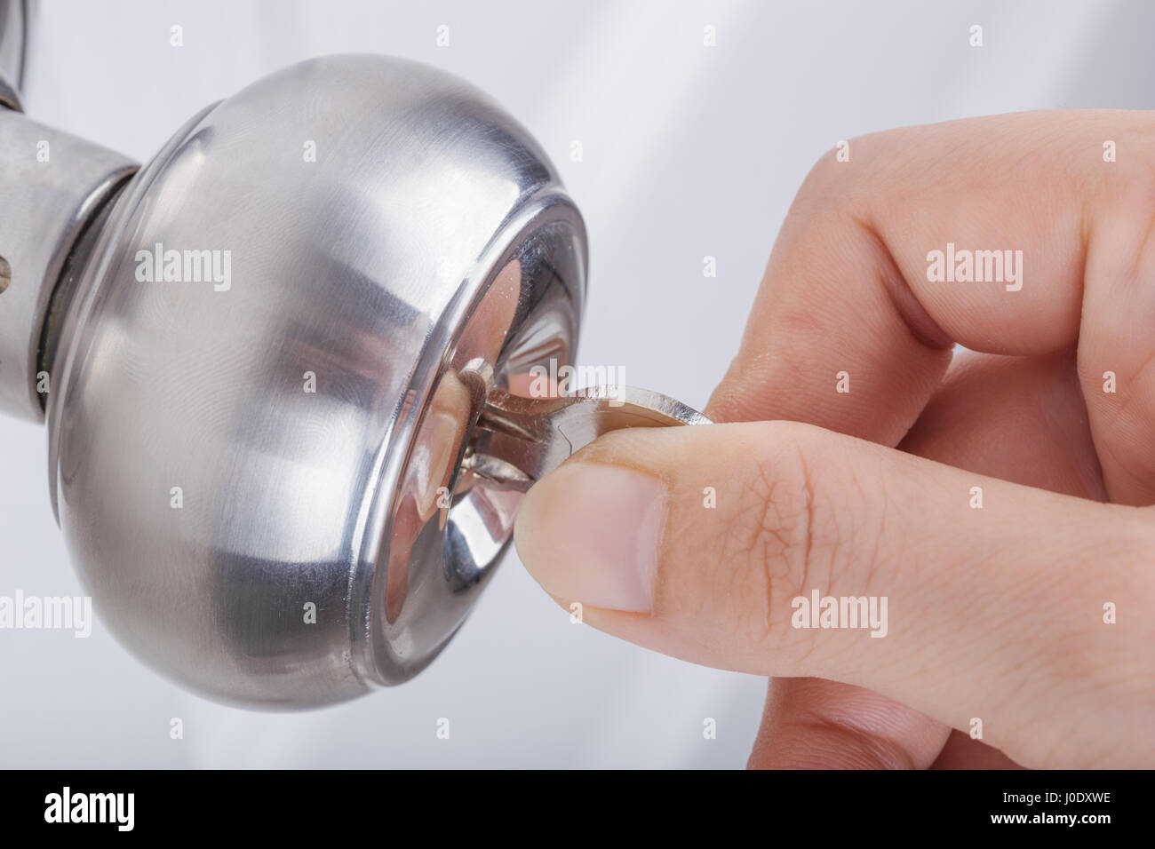 Hand key unlocking door knob hi-res stock photography and images - Alamy Hand key unlocking door knob hi-res stock photography and images - Alamy