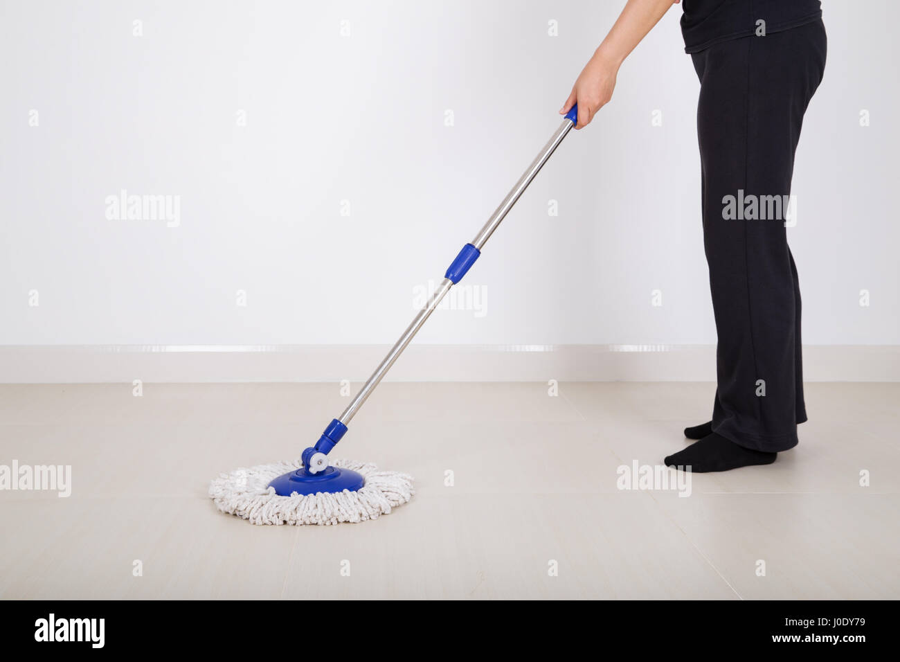 woman legs with mop cleaning floor at home Stock Photo - Alamy