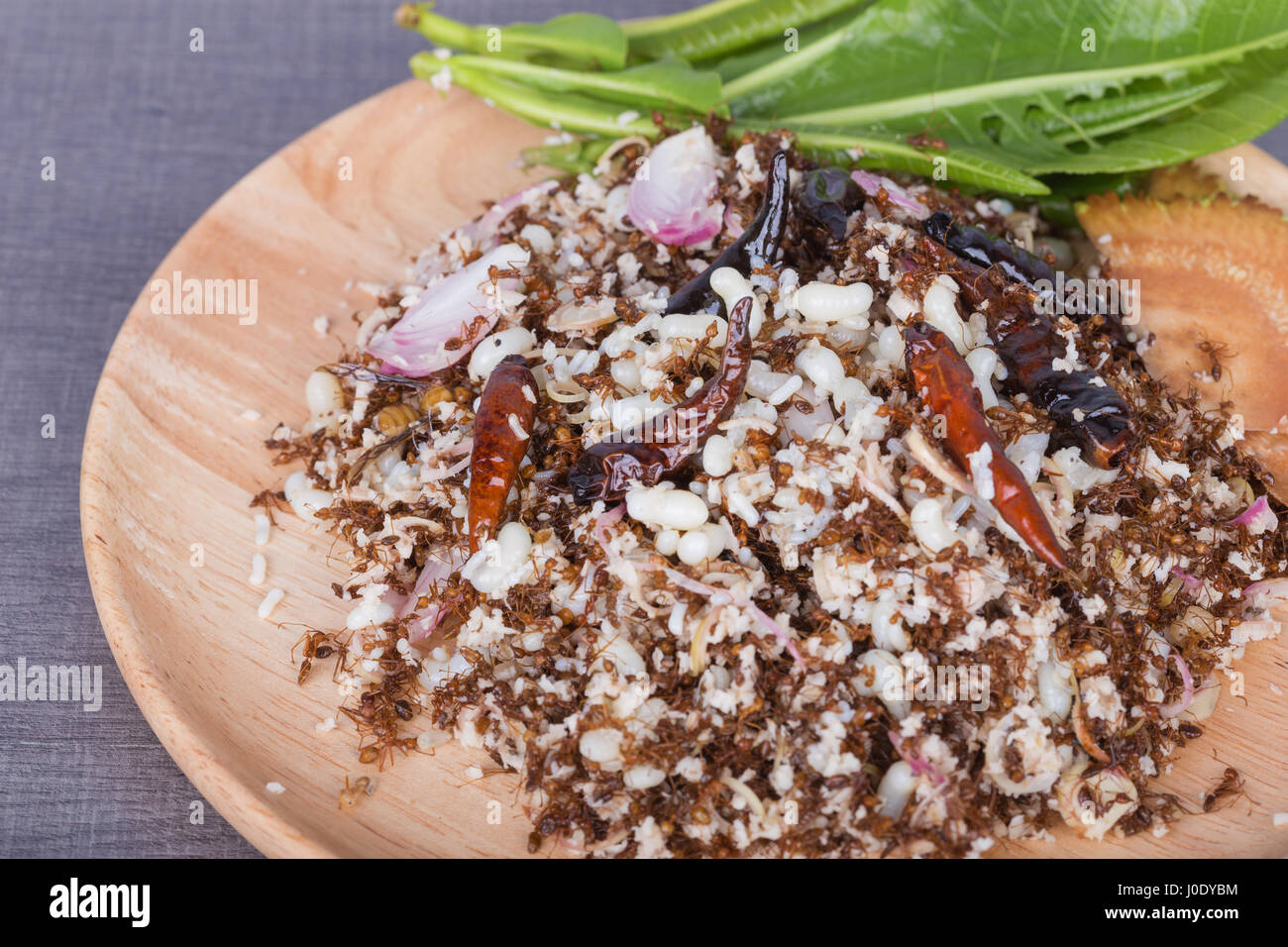 Ant Eggs Spicy Salad with Herbs on wood background Stock Photo - Alamy
