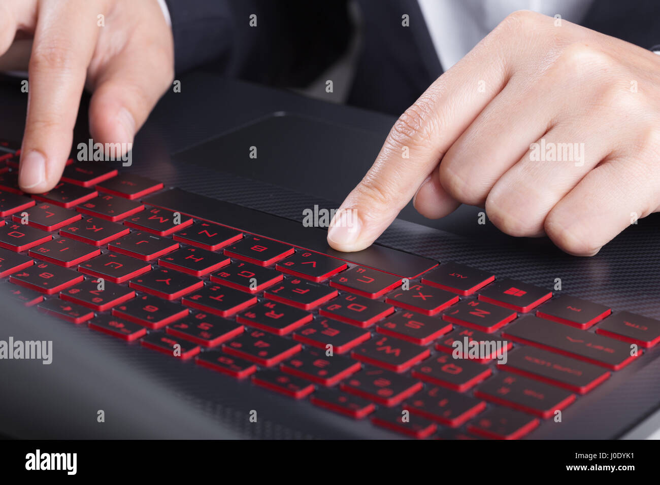 finger pushing space bar button on a laptop keyboard Stock Photo - Alamy