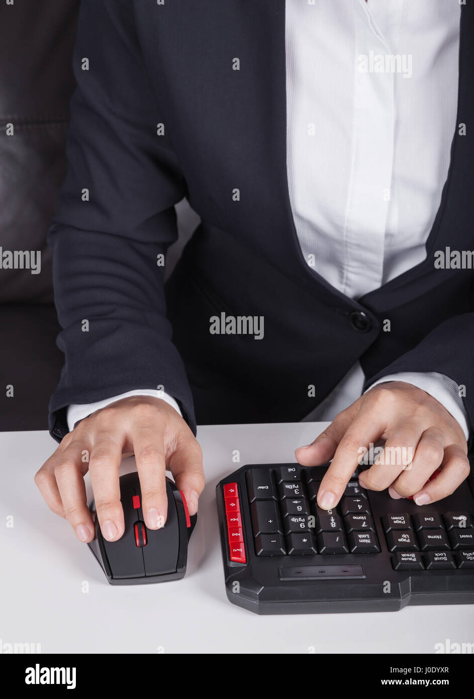 business hands working on computer keyboard and mouse Stock Photo - Alamy