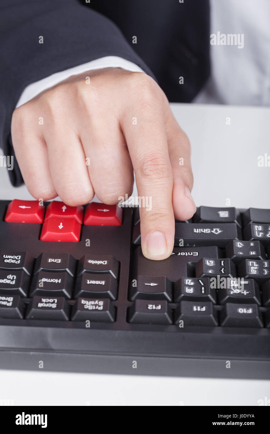 finger pushing enter button on a keyboard of computer Stock Photo - Alamy