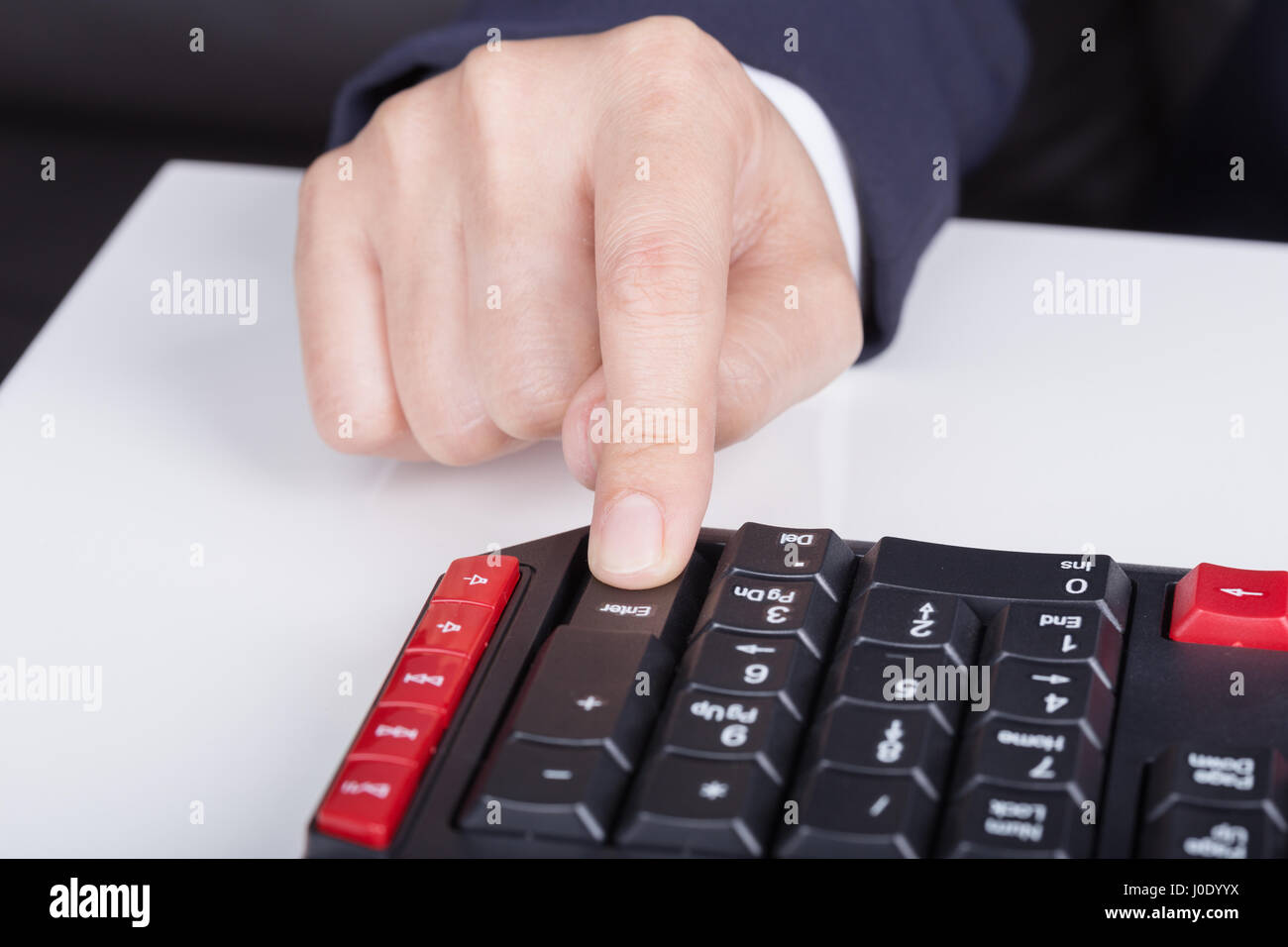 finger pushing enter button on a keyboard of computer Stock Photo - Alamy