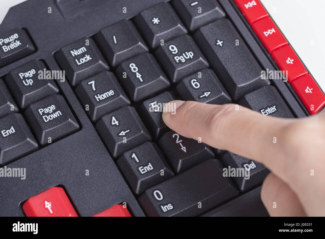 finger pushing number button on a keyboard of computer Stock Photo - Alamy
