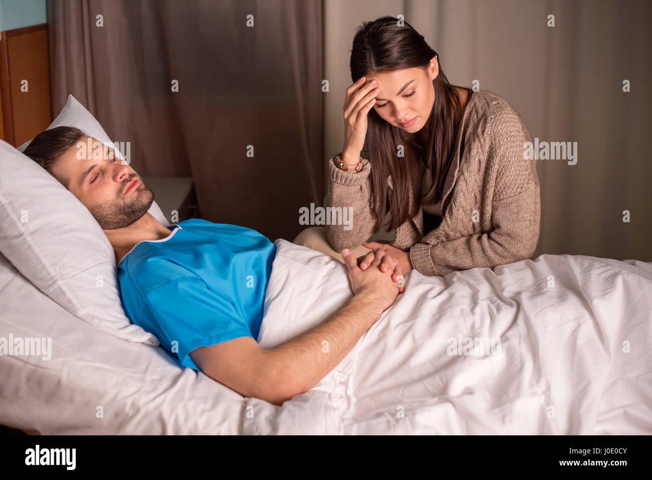 Man visiting hospital hi-res stock photography and images - Alamy