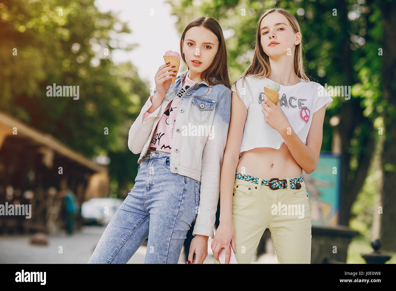 beautiful models pose for a photo in trendy clothes Stock Photo - Alamy