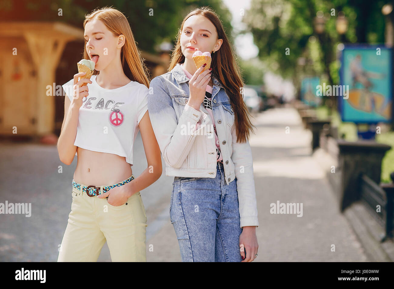 beautiful models pose for a photo in trendy clothes Stock Photo - Alamy
