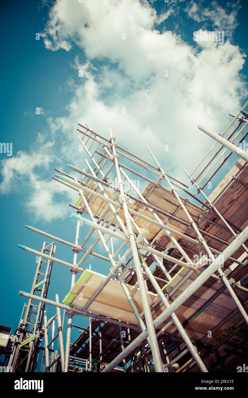 scaffolding construction with blue sky.instagram look Stock Photo - Alamy