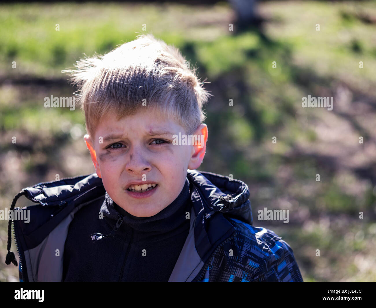 Portrait of a Caucasian boy smeared with soot Stock Photo - Alamy