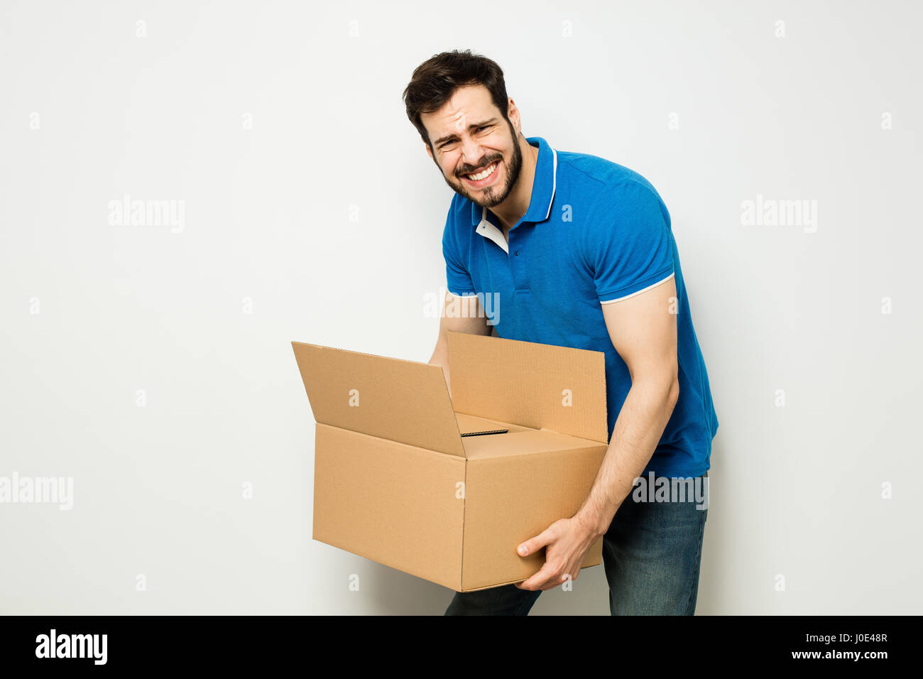 Man carrying box of personal hi-res stock photography and images - Alamy