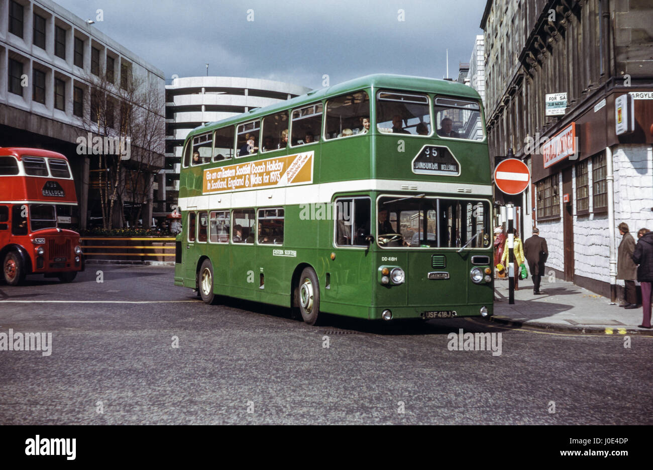Scotland, UK - 1973: Vintage image of bus in central Glasgow. Eastern ...