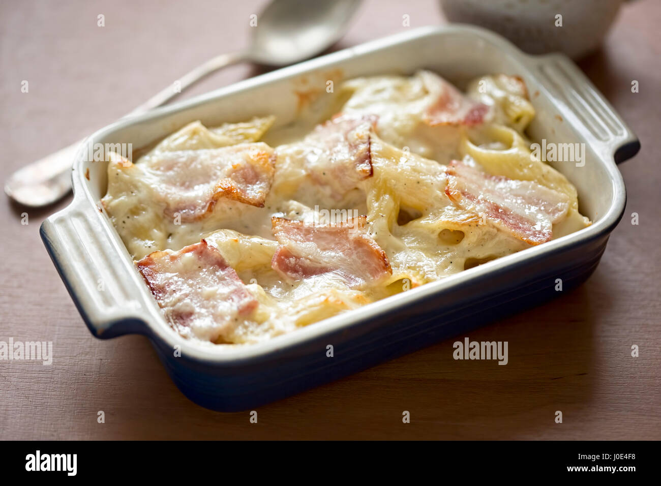 Bacon cheese pasta bake Stock Photo - Alamy