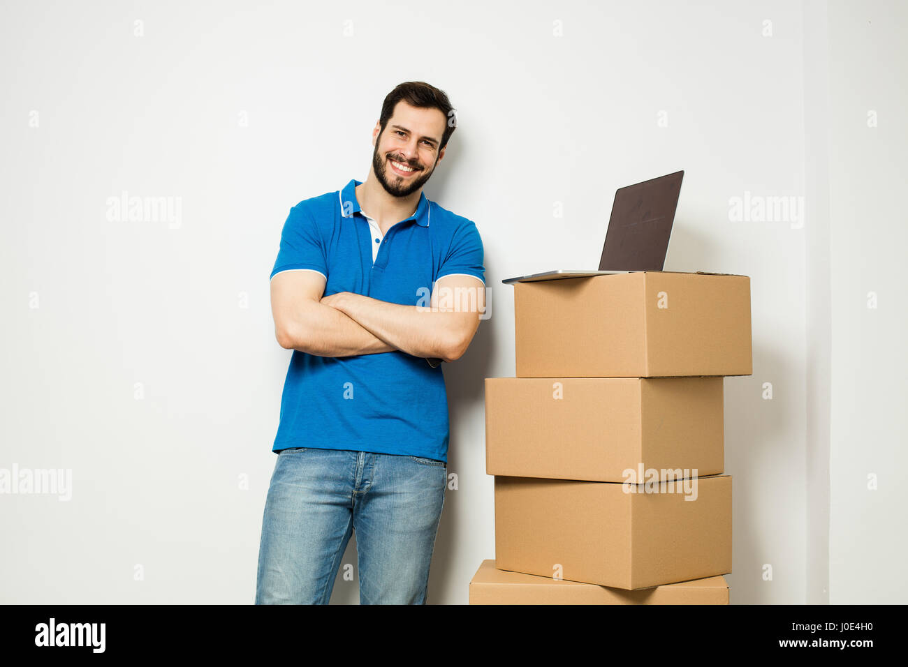 Laptop on the wall hi-res stock photography and images - Alamy