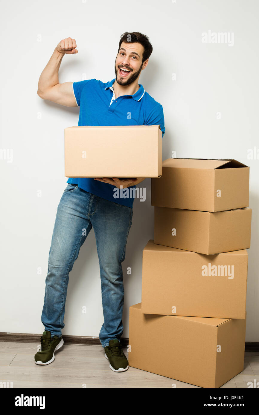 Man showing his muscles hi-res stock photography and images - Alamy
