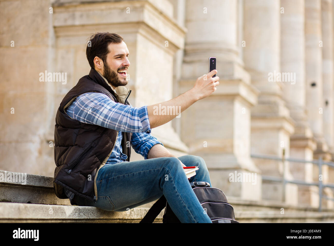 Man waiting outside school hi-res stock photography and images - Alamy