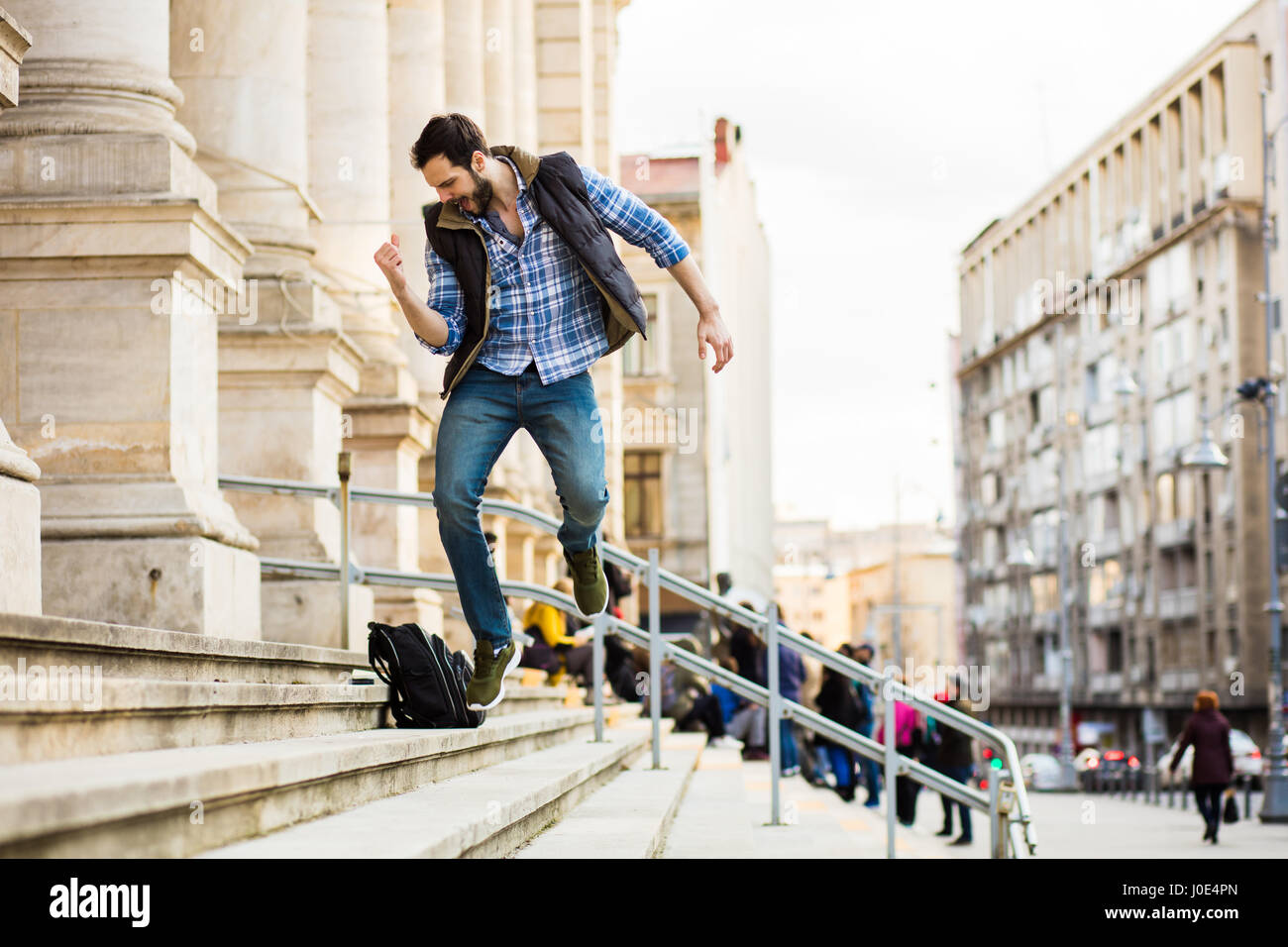 Man jumping on stairs hi-res stock photography and images - Alamy