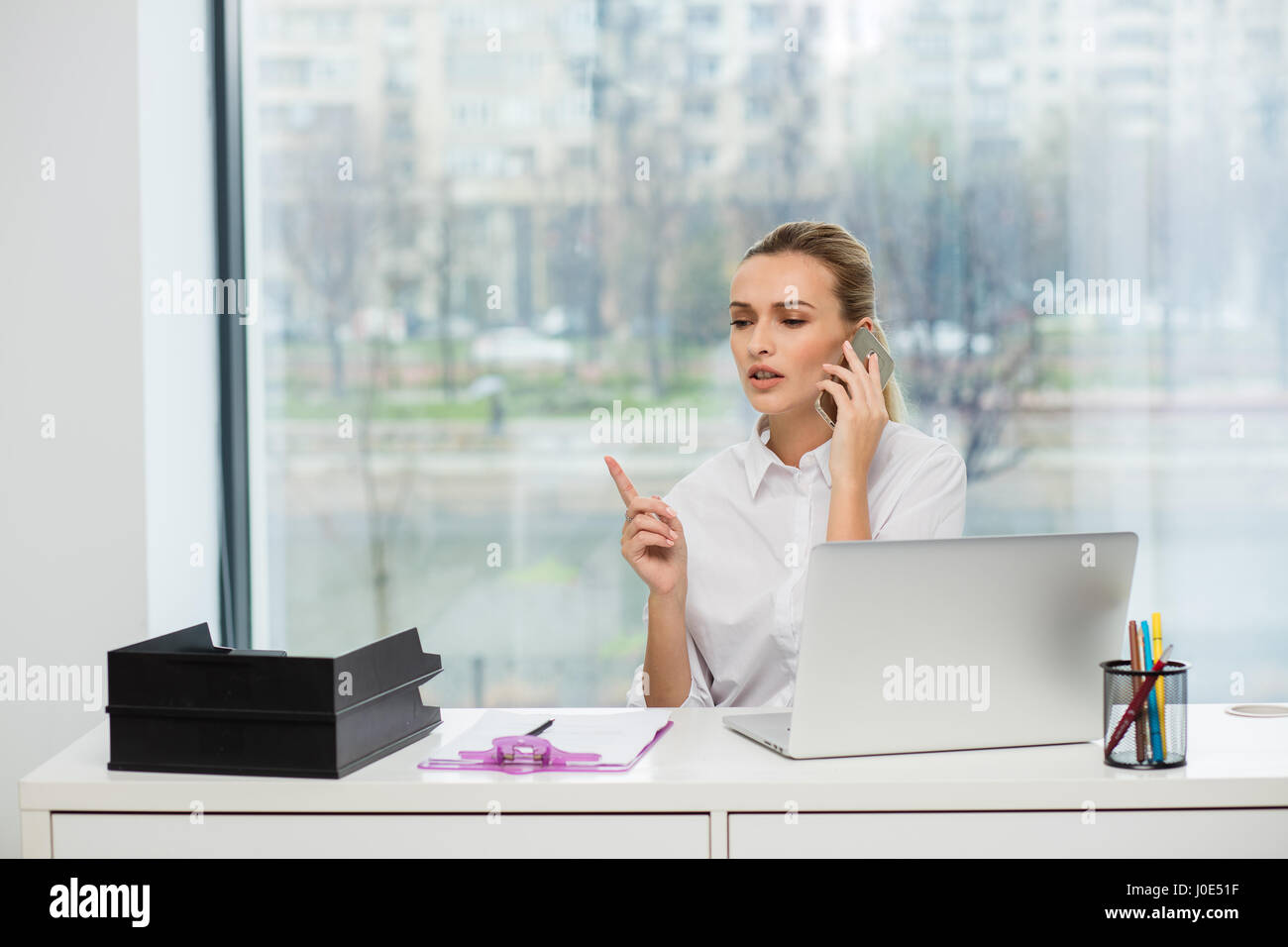 Woman making business calls working hi-res stock photography and images ...
