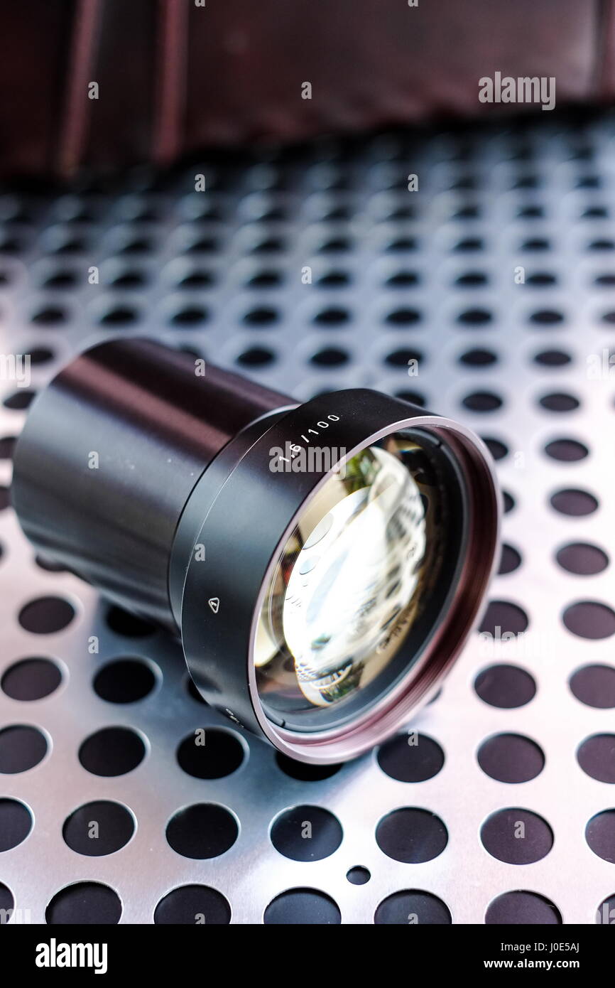Vintage professional projection movie lens on metalic background Stock ...
