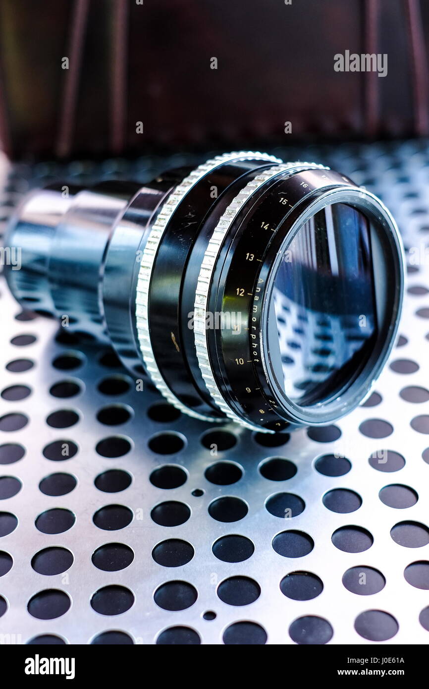 Vintage professional projection movie lens on metalic background Stock ...