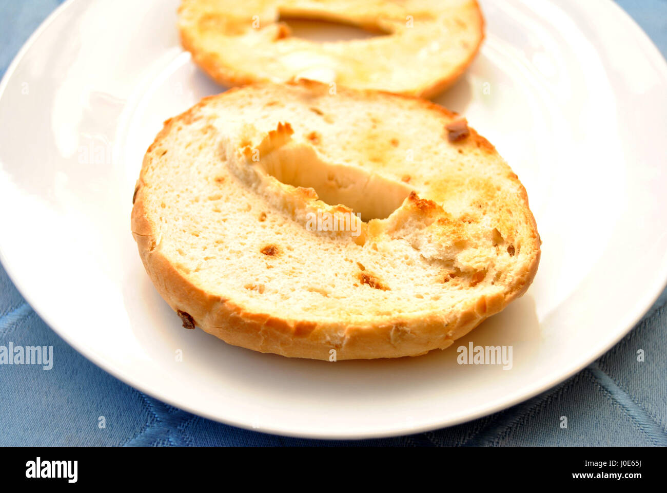 Toasted Onion Bagel Stock Photo - Alamy